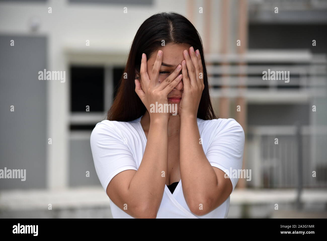 An Adult Female Afraid Stock Photo - Alamy