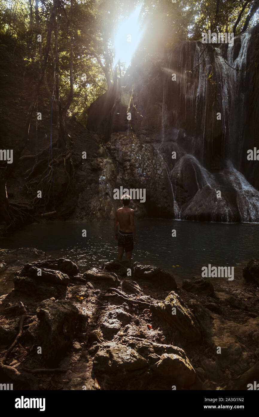 People standing near waterfall hi-res stock photography and images - Alamy