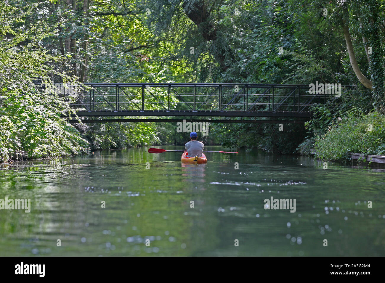A person gently floating down river Stock Photo - Alamy