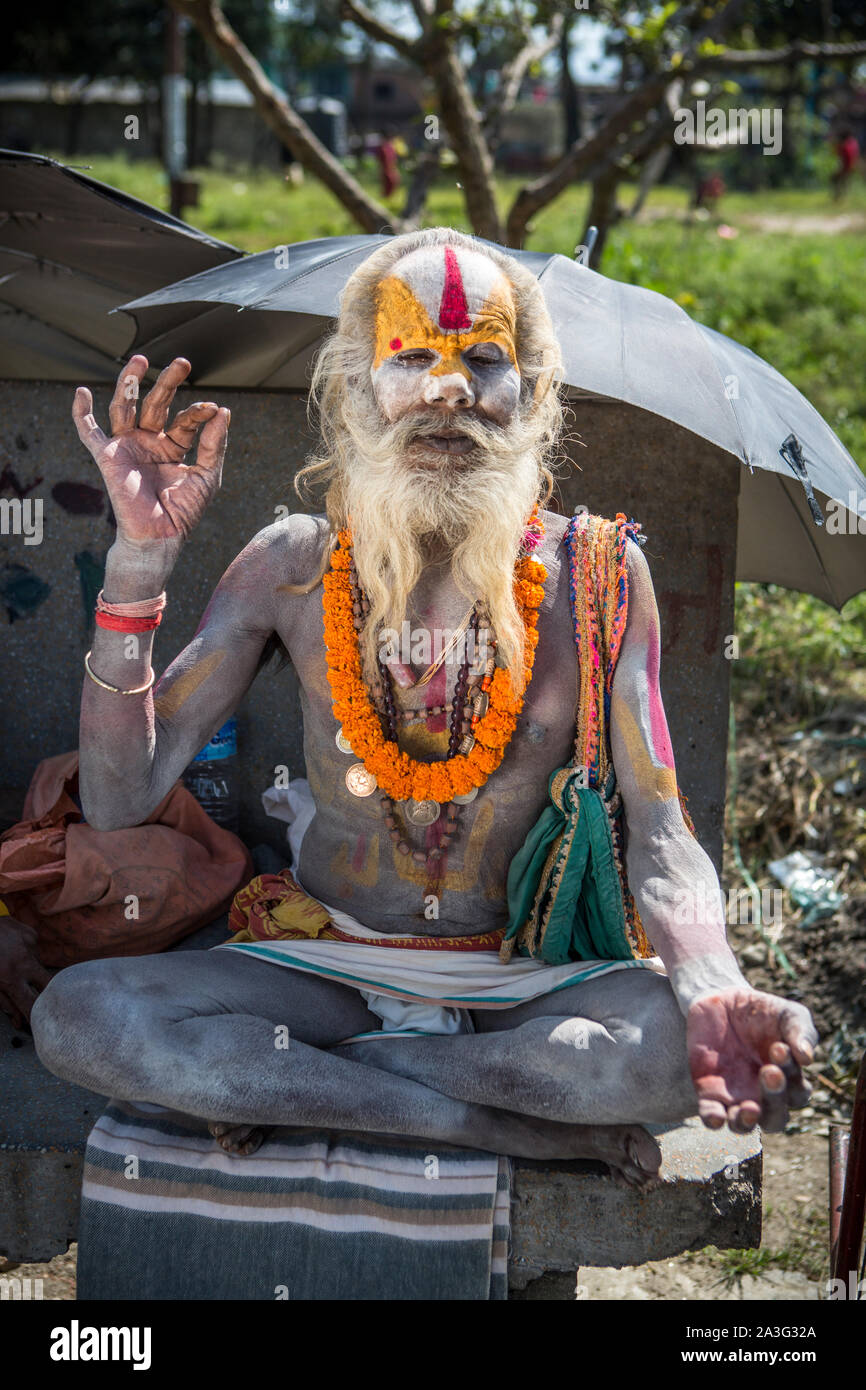 A sadhu, a Hindu holy man, at Pashupatinath Temple in Kathmandu, Nepal ...
