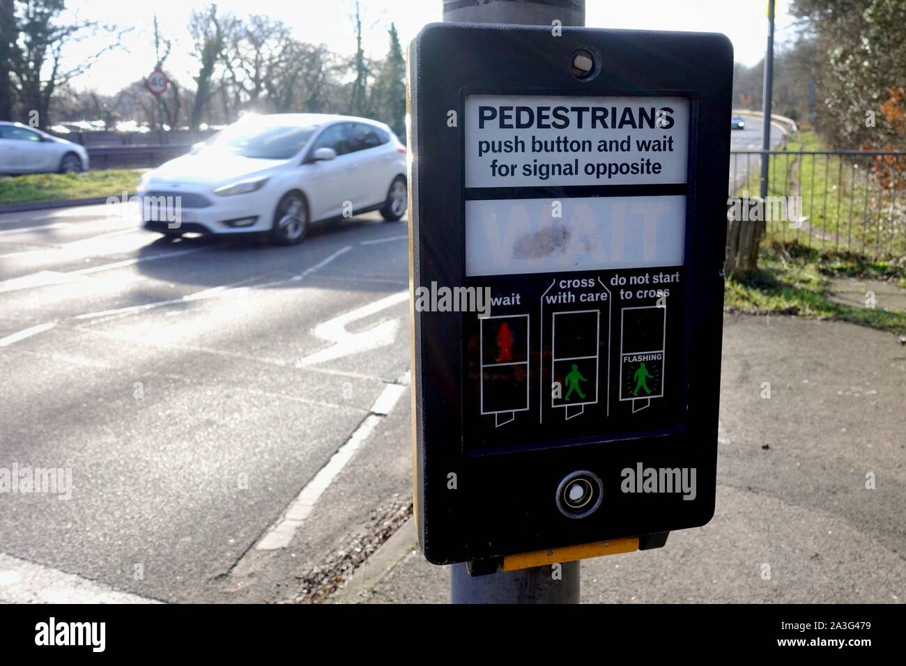Camberley, Surrey, UK - February 6 2018: Pedestrian crossing button and ...