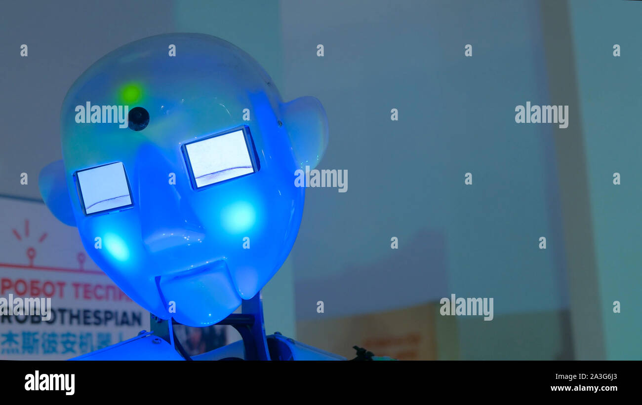 Funny humanoid robot singing and moving head Stock Photo - Alamy