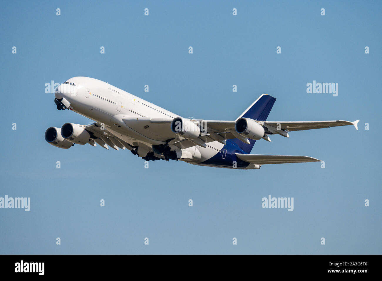 Blank unlabeled Airbus A380 4-engine jet airliner starting at the ...