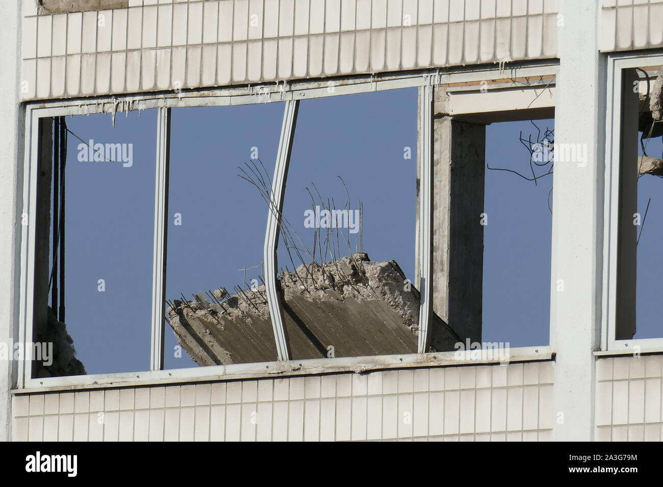 Old window at a demolition house with blue sky and rubble Stock Photo ...