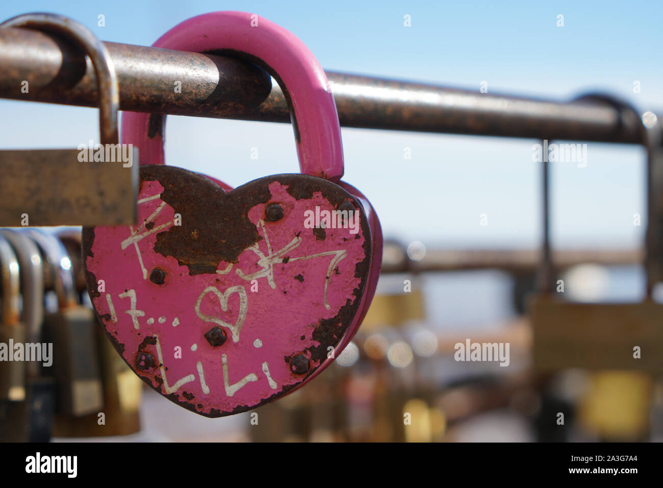 Love lock on railing in Barcelona Stock Photo - Alamy
