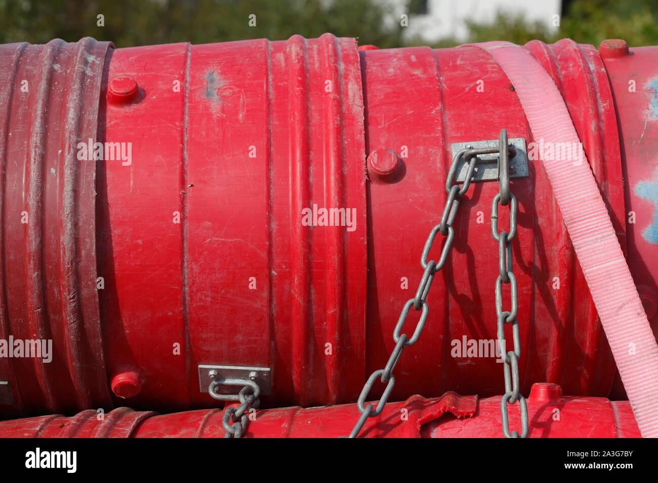 Red plastic buckets, hangpipe, waste pipe, Germany Stock Photo - Alamy