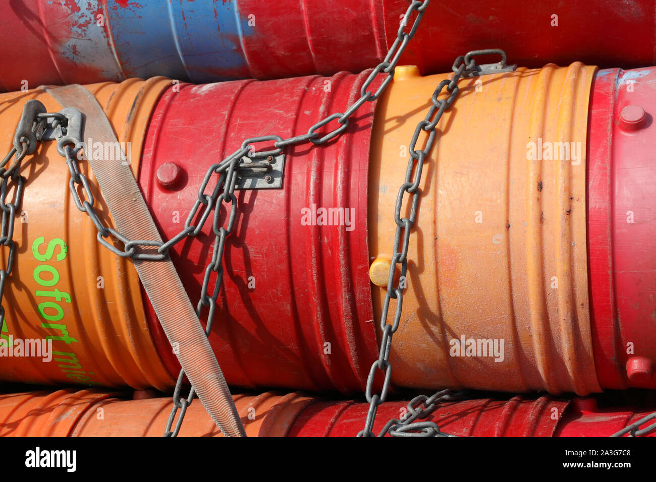 Red plastic buckets, hangpipe, waste pipe, Germany Stock Photo - Alamy