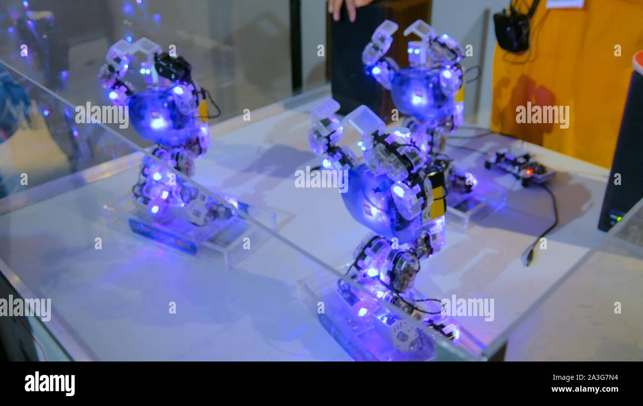 Humanoid robots dancing at robotic show Stock Photo - Alamy