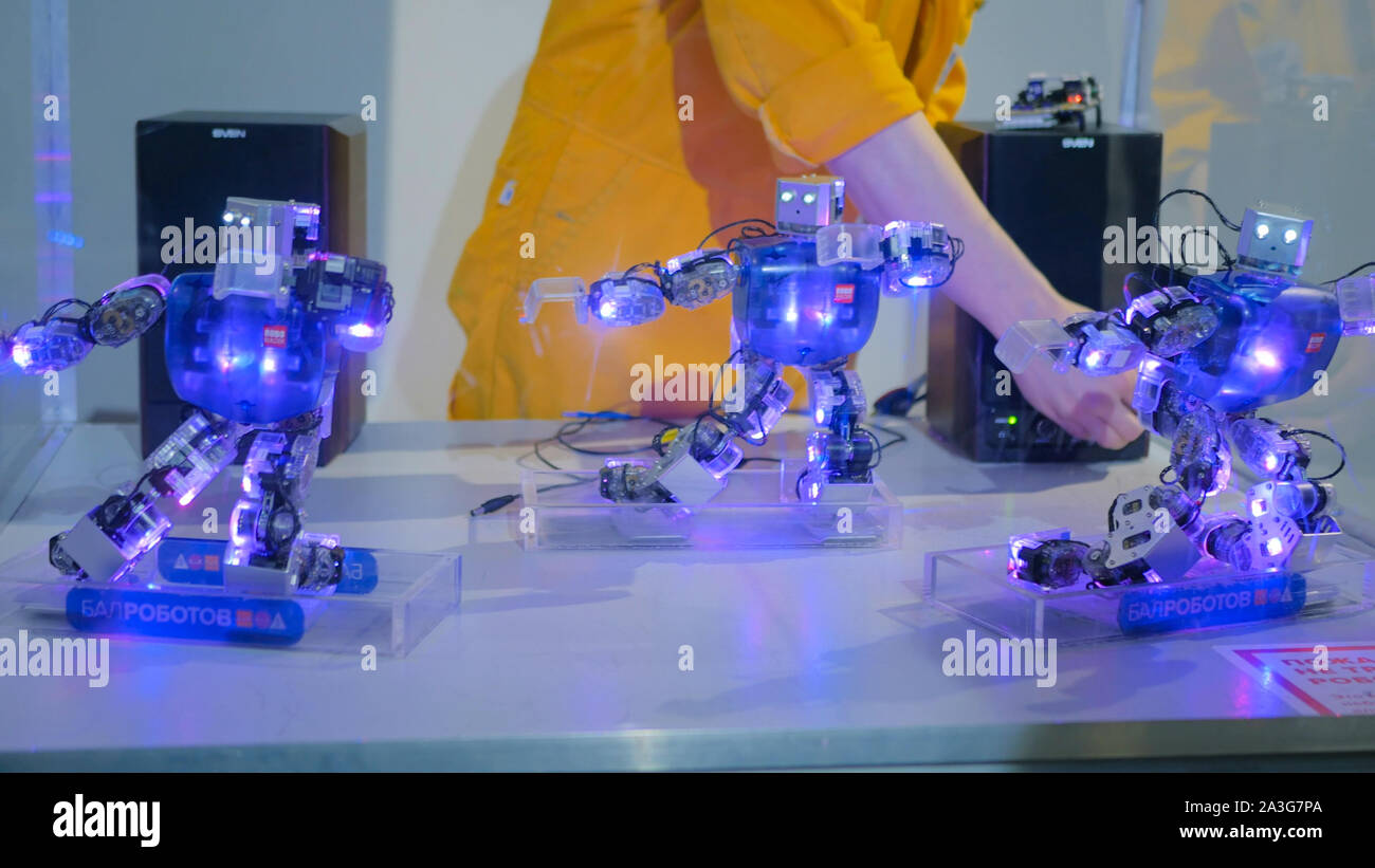 Humanoid robots dancing at robotic show Stock Photo - Alamy
