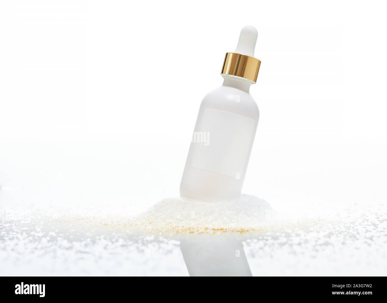white dropper bottle on white set with reflection Stock Photo - Alamy