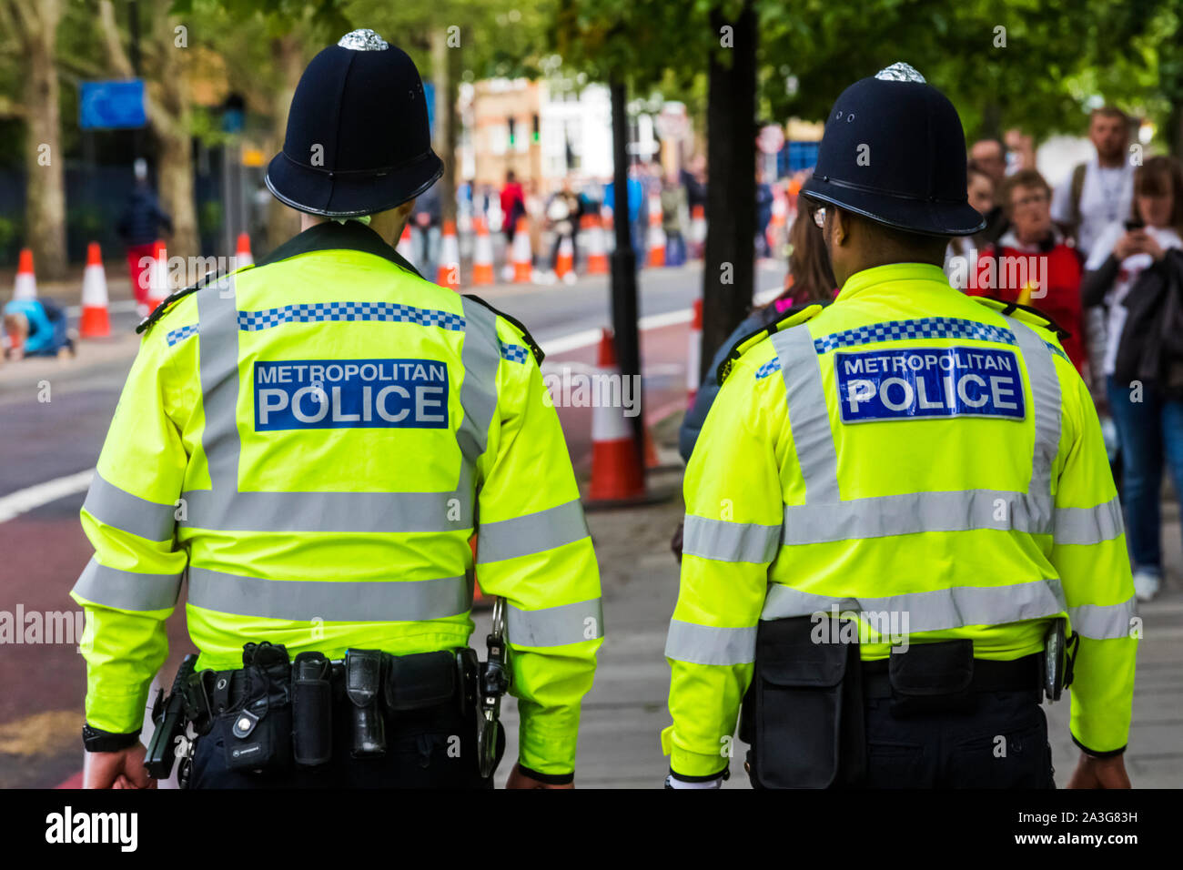 British policeman rear view hi-res stock photography and images - Alamy