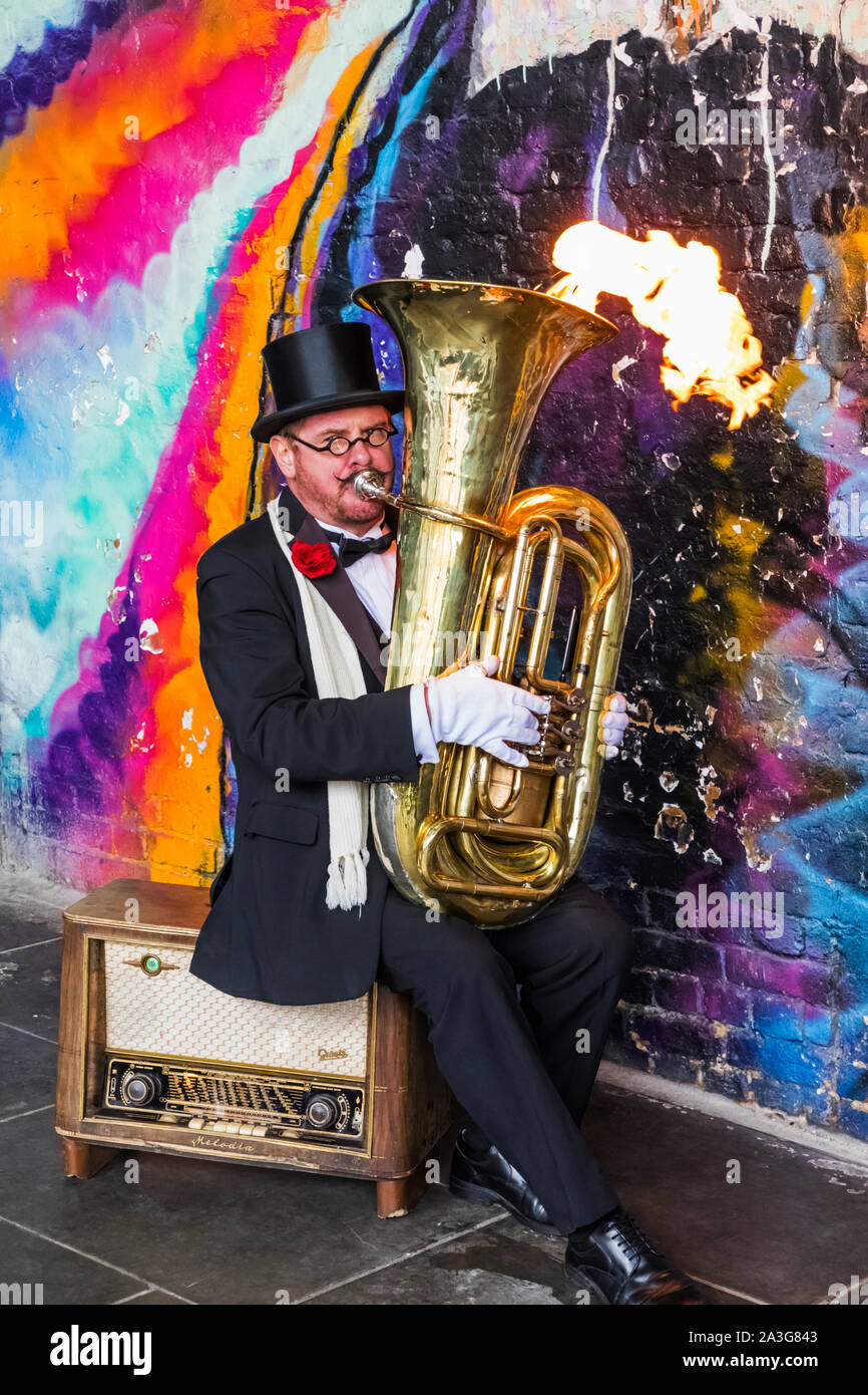 England, London, Southwark, Bankside, Street Musician Playing Fire ...