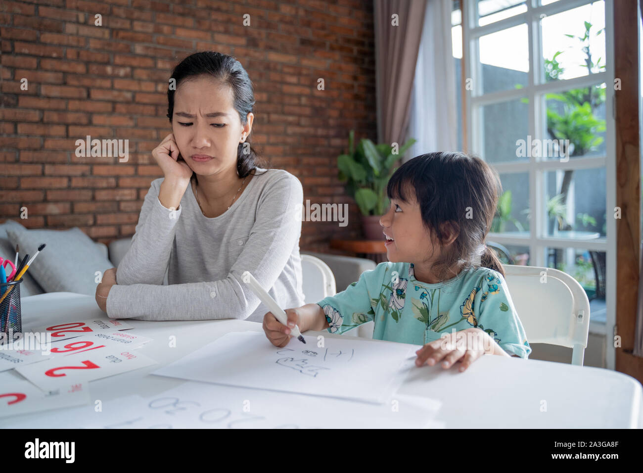 Angry mother and homework hi-res stock photography and images - Alamy