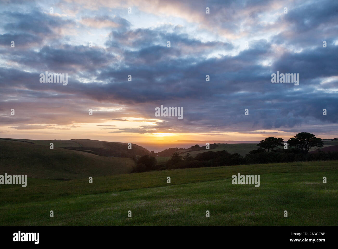 Sunset over Hope Cove, Devon, England, United Kingdom Stock Photo - Alamy