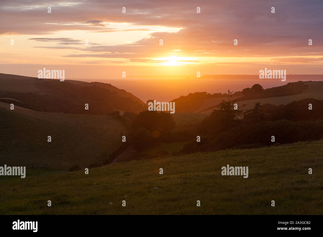 Sunset over Hope Cove, Devon, England, United Kingdom Stock Photo - Alamy
