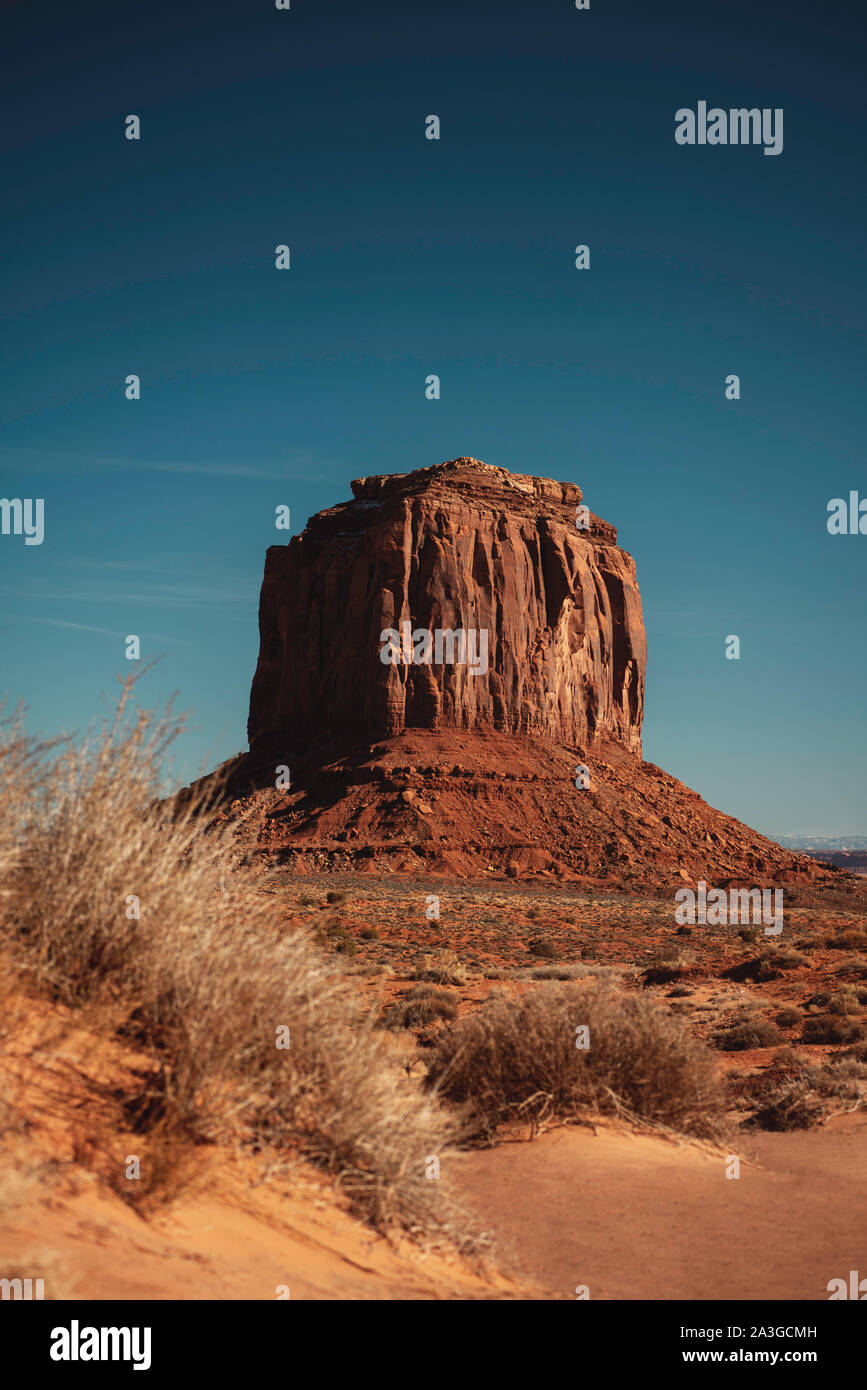 Sandstone formation beautifully lit by the afternoon desert sun in ...