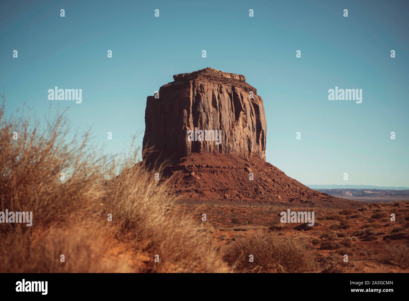 Sandstone formation beautifully lit by the afternoon desert sun in ...