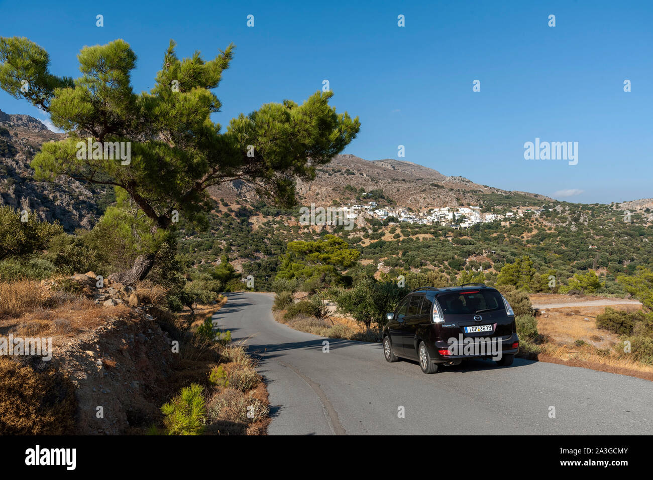 Mountain village of Pefki seen from Agios Stefanos road, Crete, Greece ...