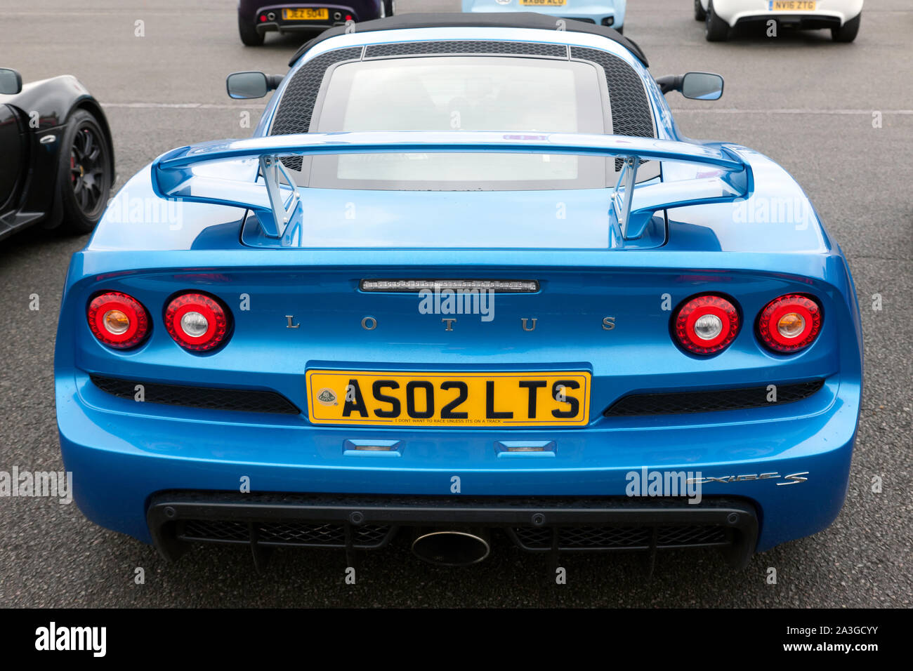 Rear view of a Blue, 2013, Lotus Exige S, on display at the 2019 ...