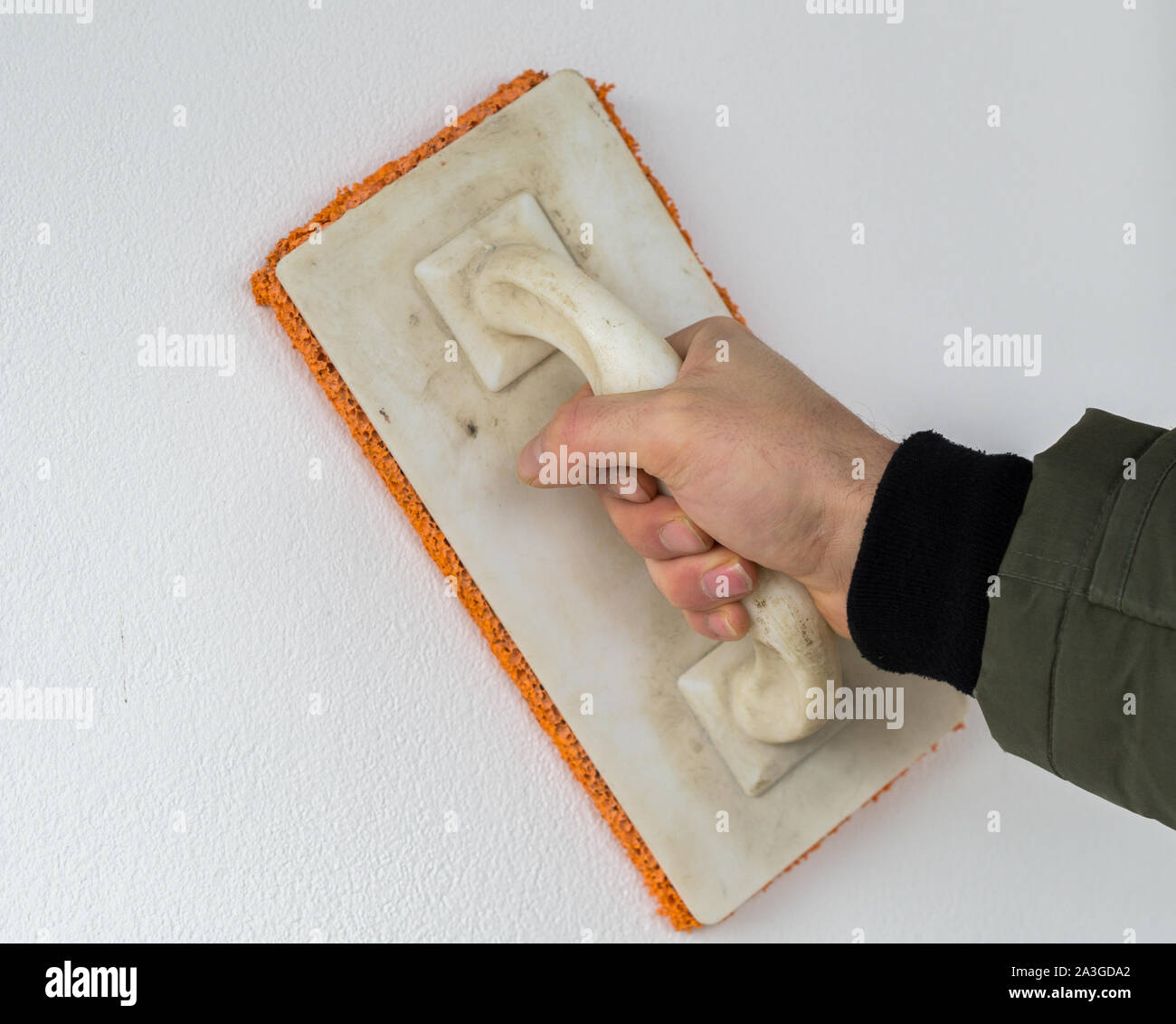 Grater wall plaster mason Stock Photo - Alamy