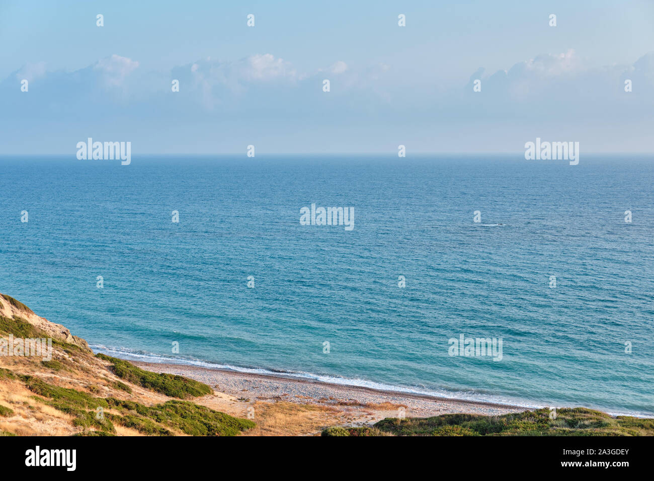 Shot of a picturesque beach of the azure mediterranean sea surrounded ...