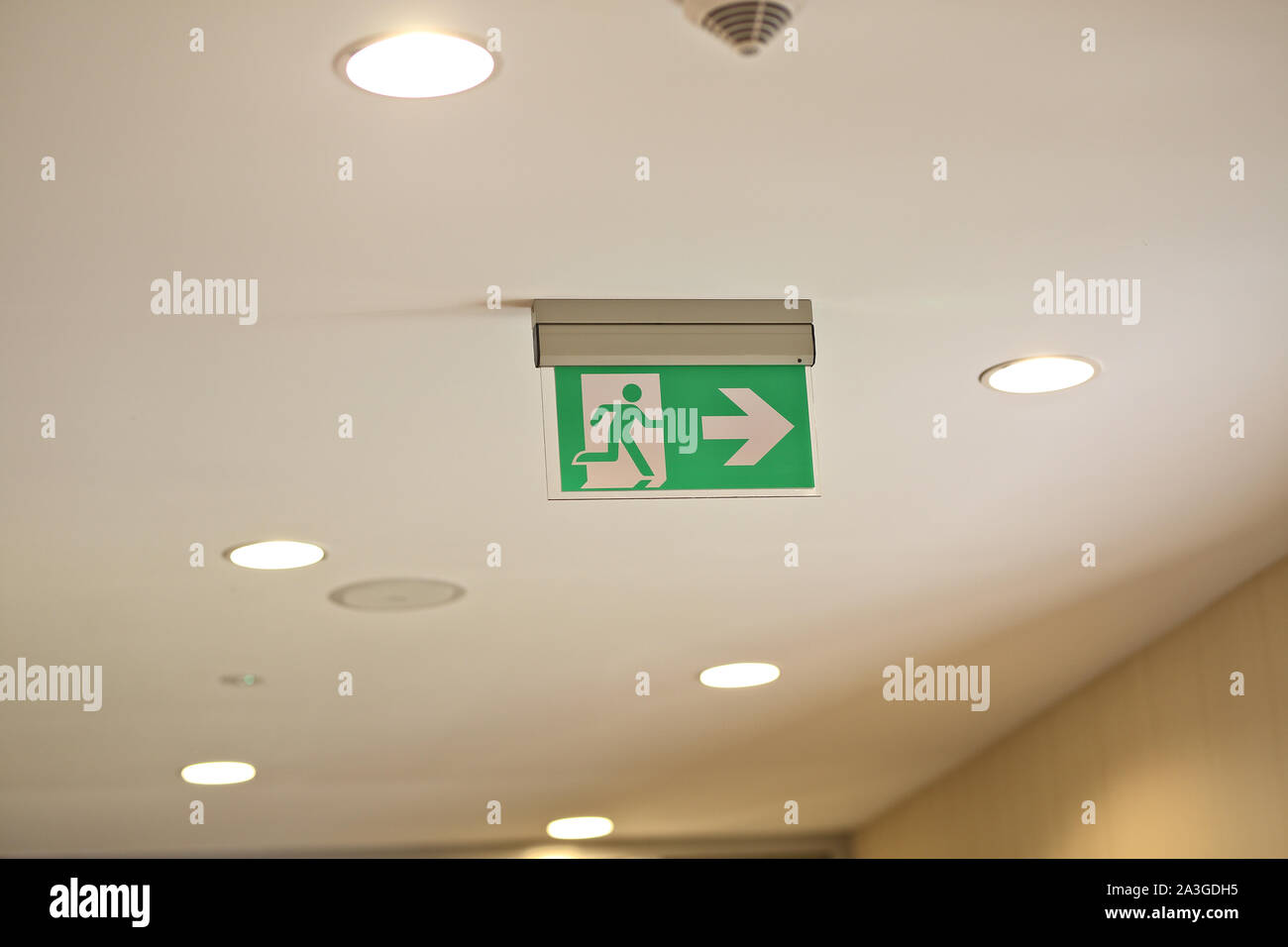 Emergency exit in office building Stock Photo - Alamy