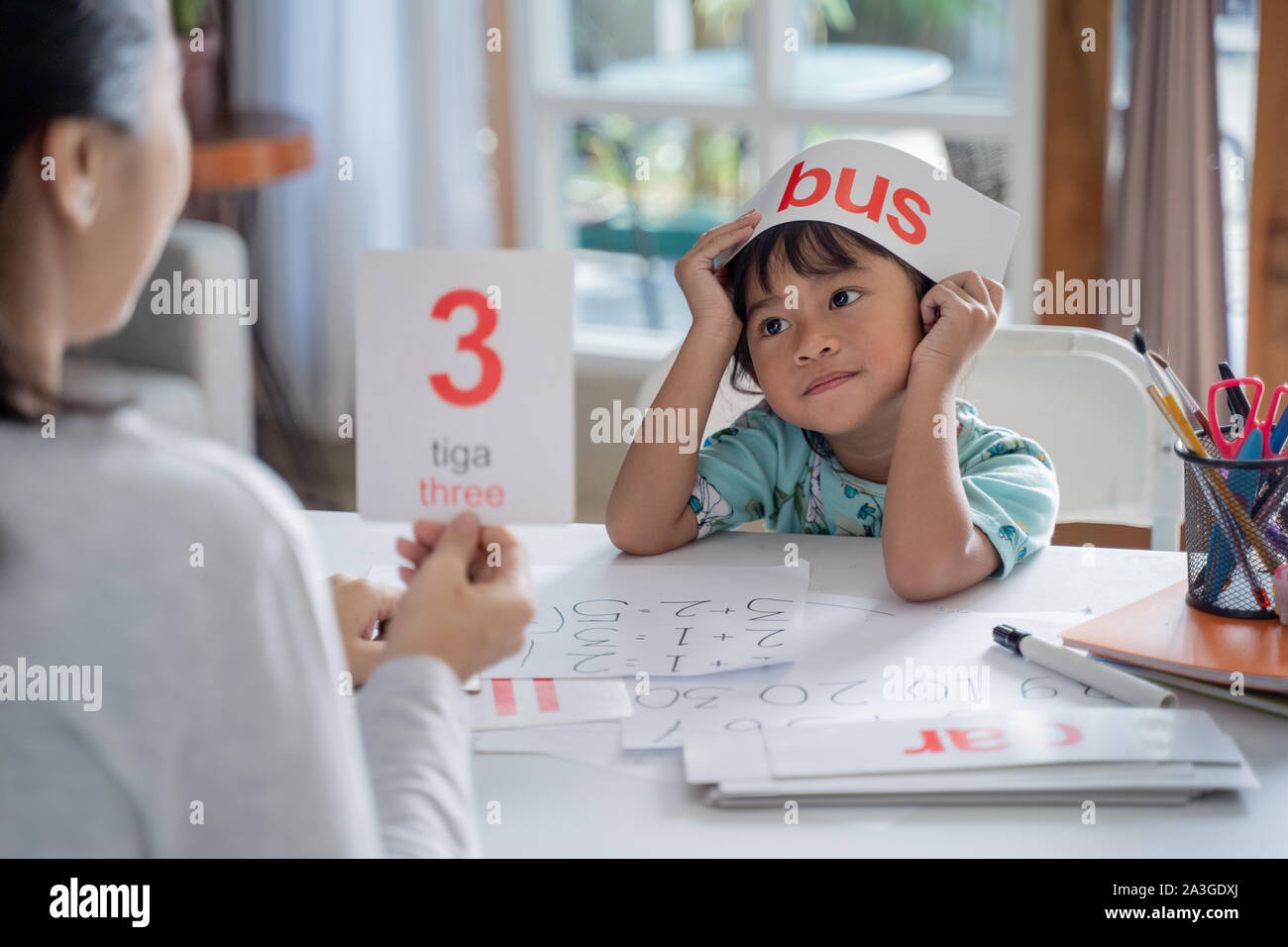 kid enjoy learning number and word using flashcard with mother at home ...