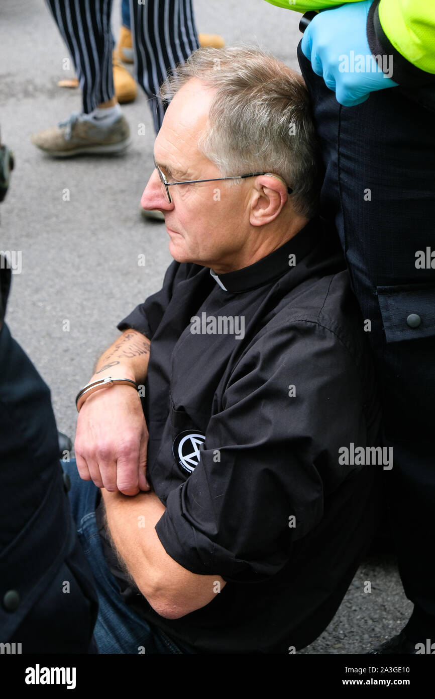 Priest handcuffs hi-res stock photography and images - Alamy
