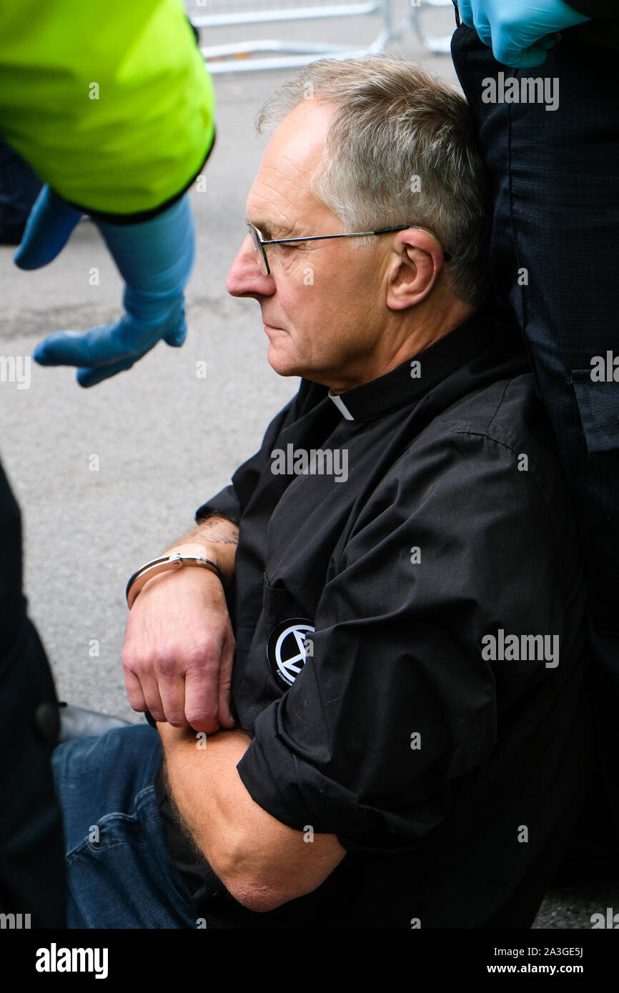 Priest handcuffs hi-res stock photography and images - Alamy