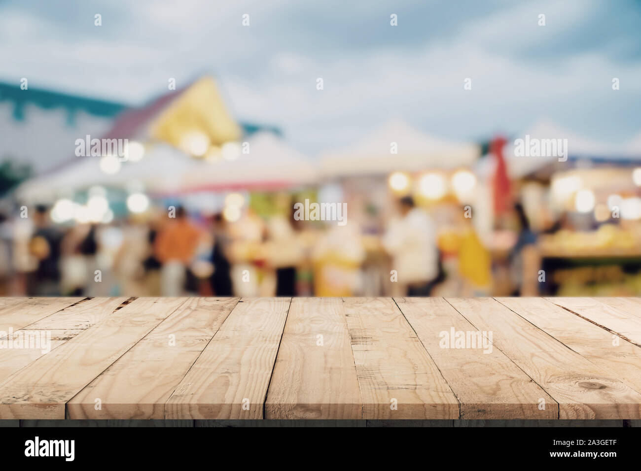 Empty wood table and Vintage tone blurred defocused of crowd people in ...