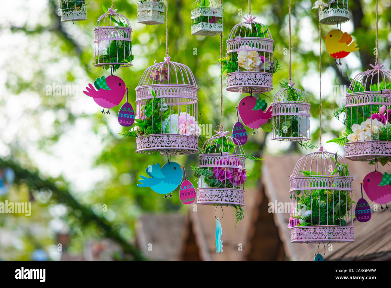 easter decoration birds with eggs and flowers Stock Photo - Alamy