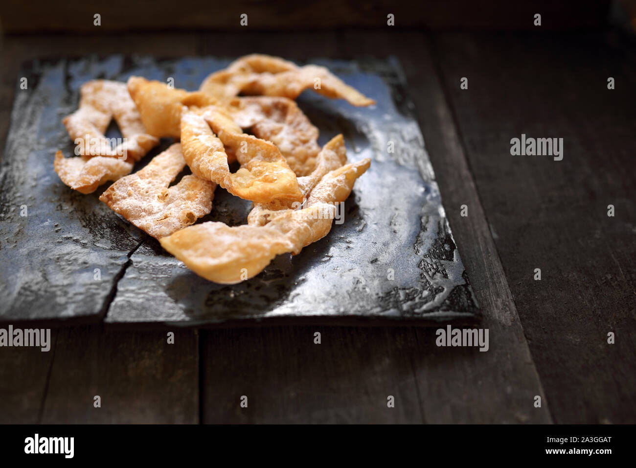 Angel wings.Traditional shortbread crepes with powdered sugar, regional ...