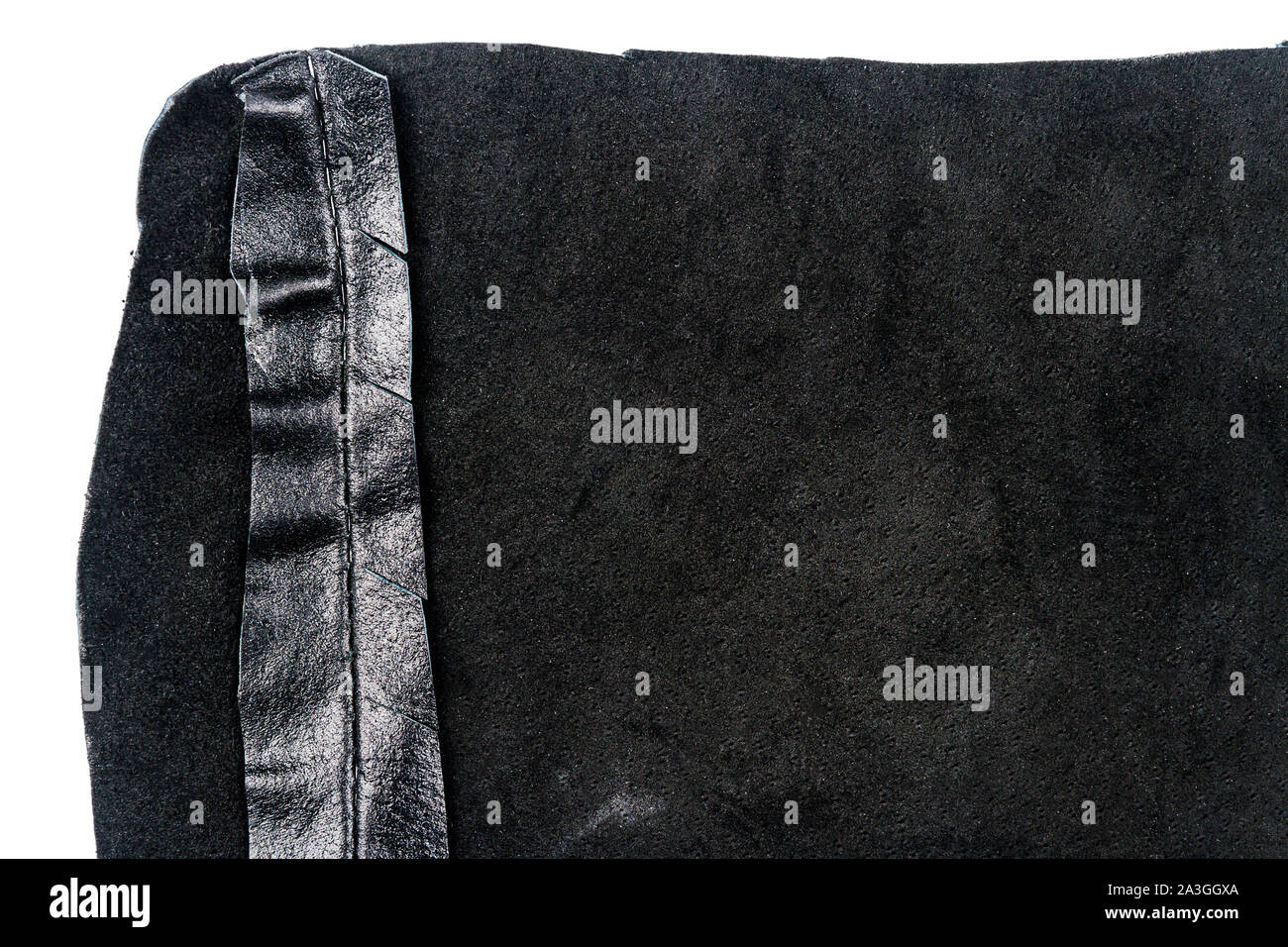 Piece of messy black leather isolated on white background. Crumpled ...