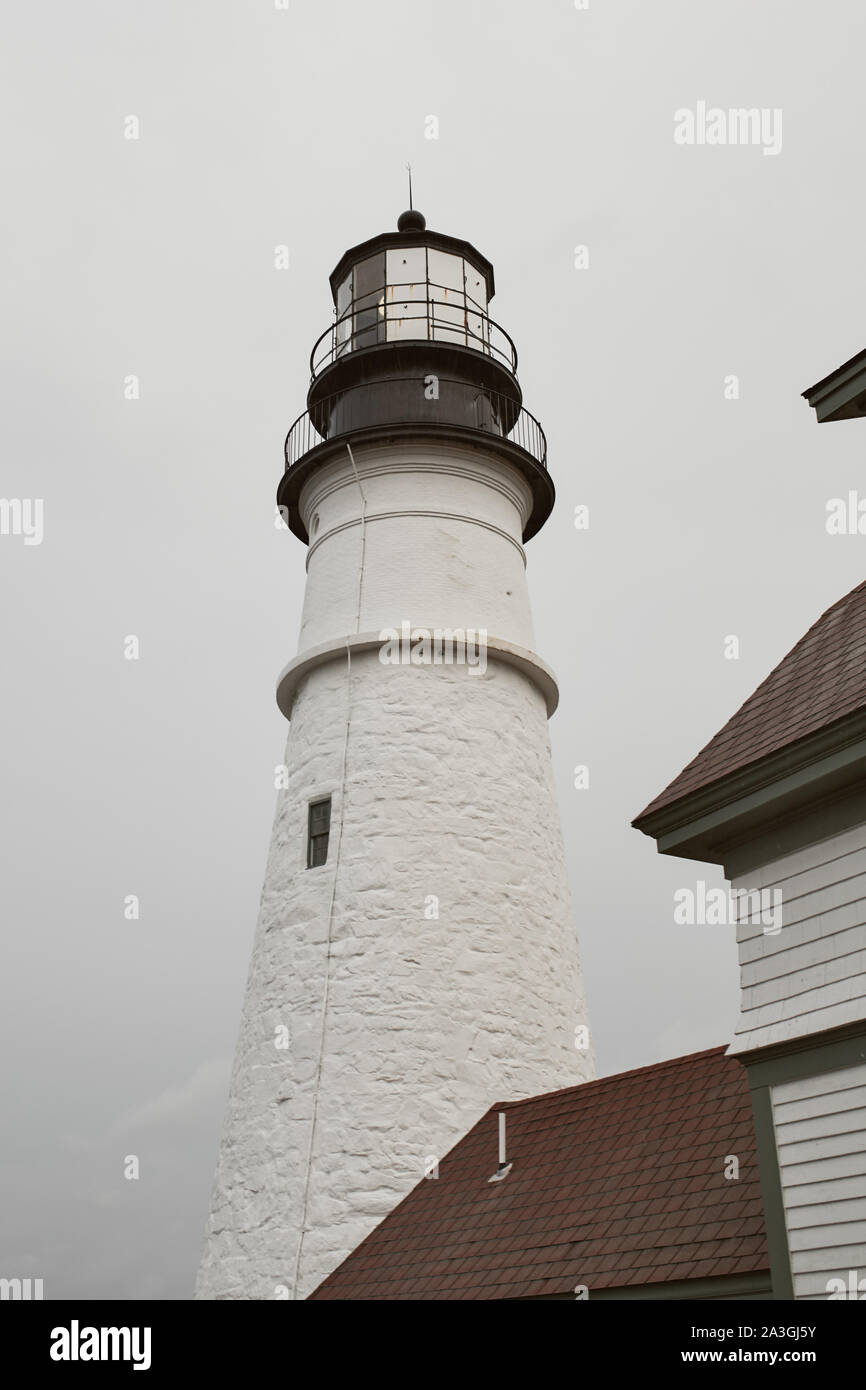Portland Head Lighthouse Museum on a cold and stormy Fall day in Cape ...
