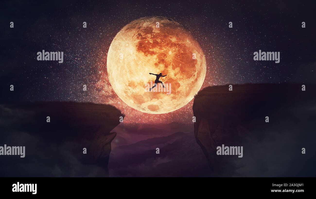 Surreal scene, self overcome concept, as determined man jump over a ...