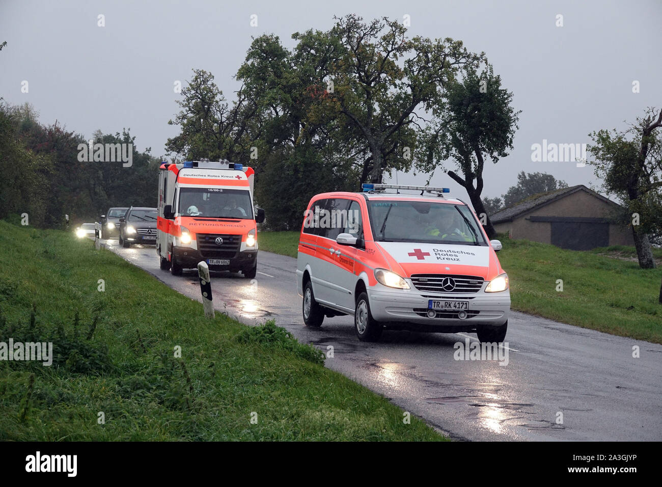 Zemmer Rodt, Germany. 08th Oct, 2019. Ambulances drive on a road near ...