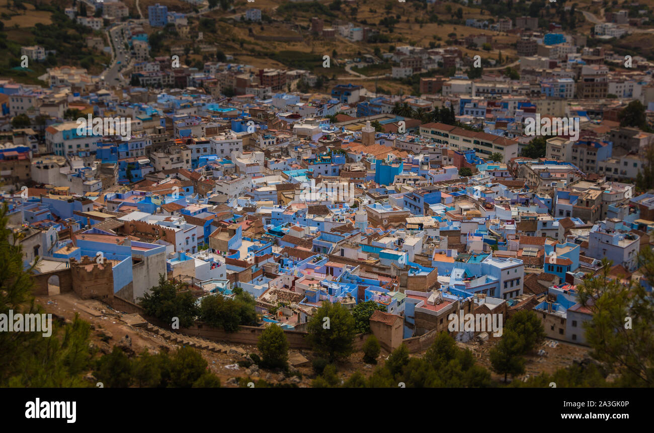 A picture of the stacked rooftops and houses of Chefchaouen as seen ...