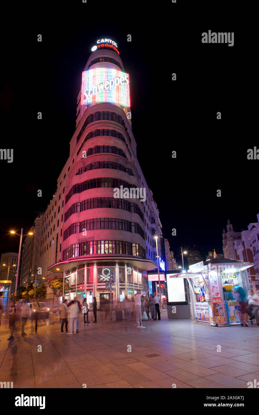 Capitol Building at night in Plaza del Callao, Madrid, Spain Stock ...