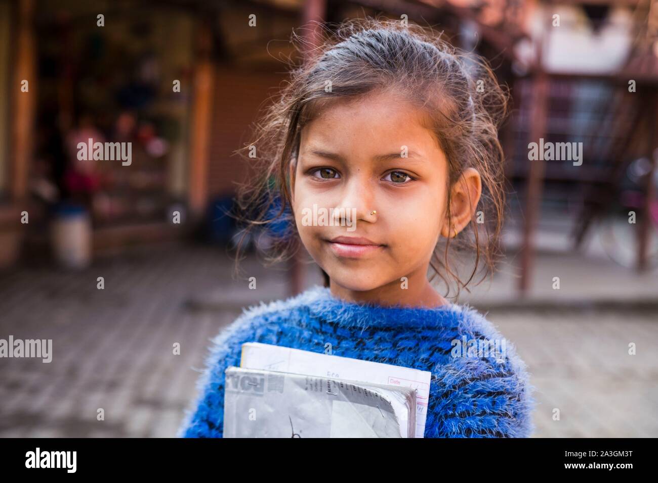 Nepal, Chitwan, Ratnanagar, portrait of a girl Stock Photo - Alamy