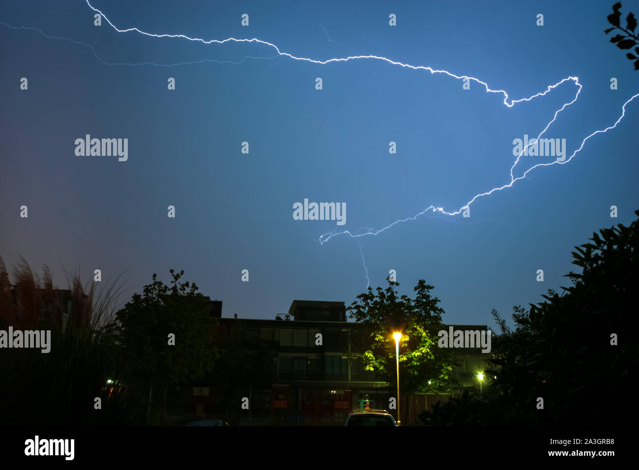Large bright cloud to cloud lightning in zig zag pattern Stock Photo ...