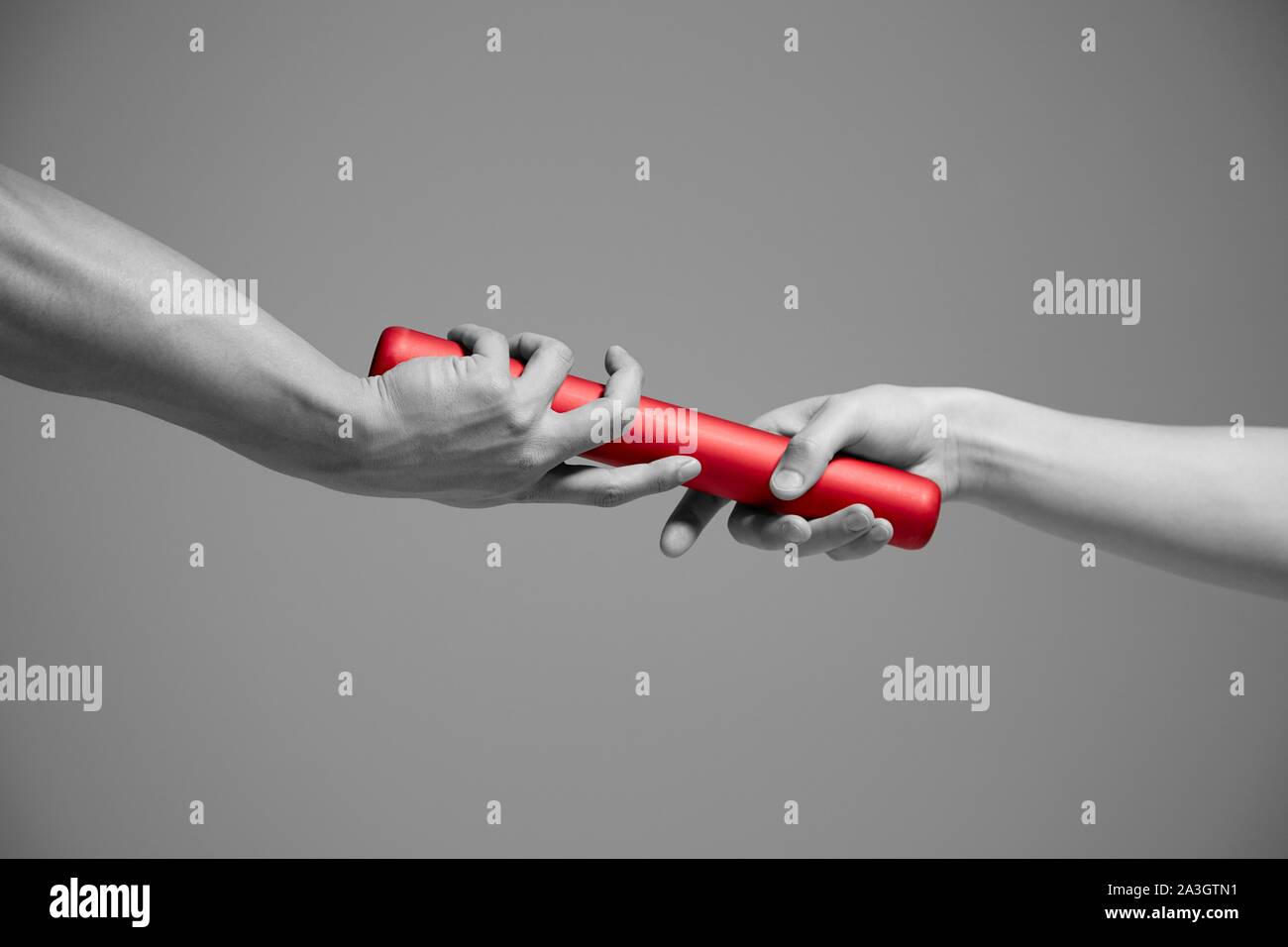 Hands athlete holding baton hi-res stock photography and images - Alamy