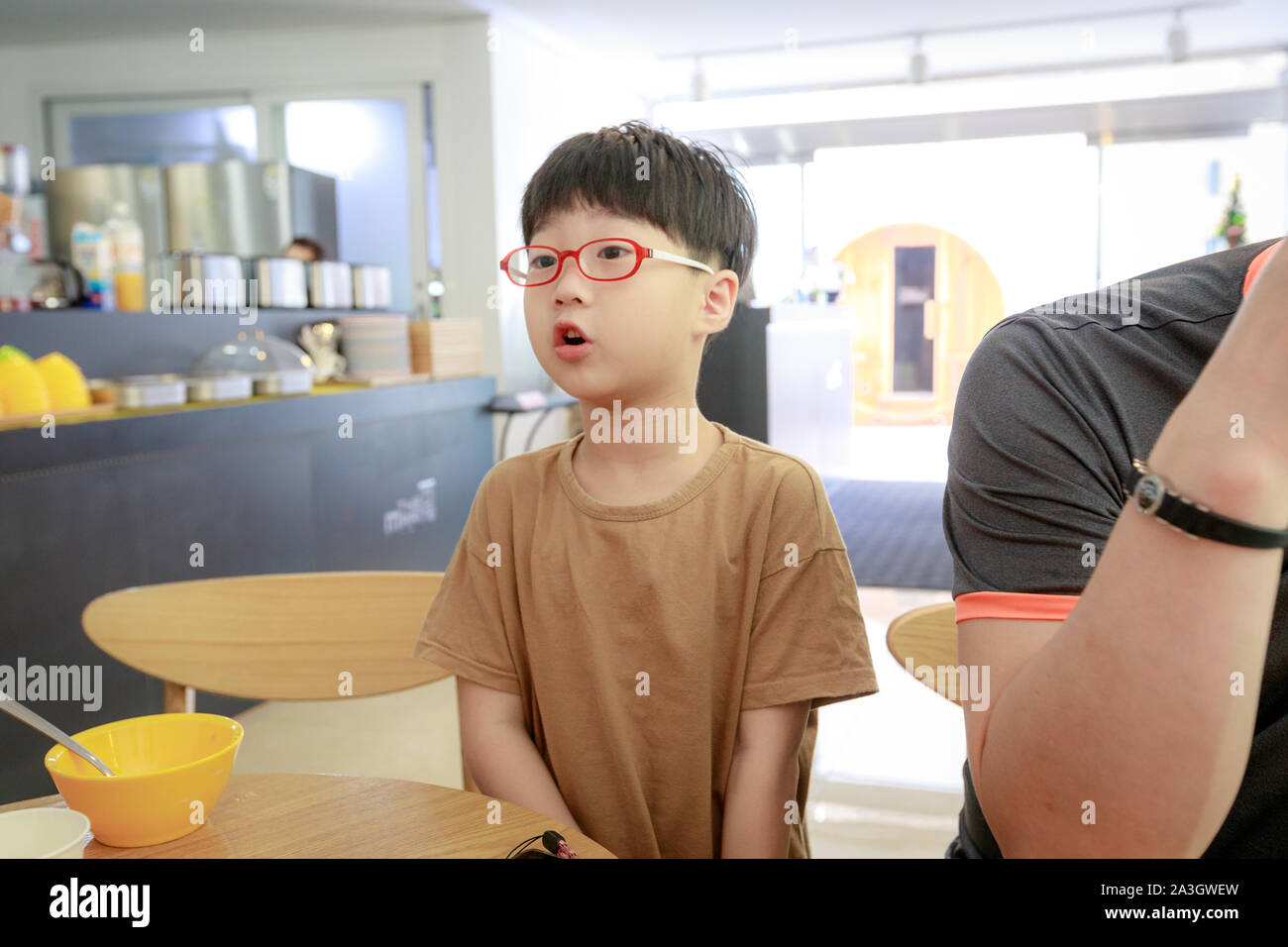 Cute little asian boy talking to something, summer season Stock Photo ...