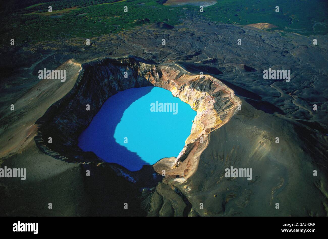 Russia, Kamchatka, Bolshoi volcano Semiachik and its acid lake seen ...