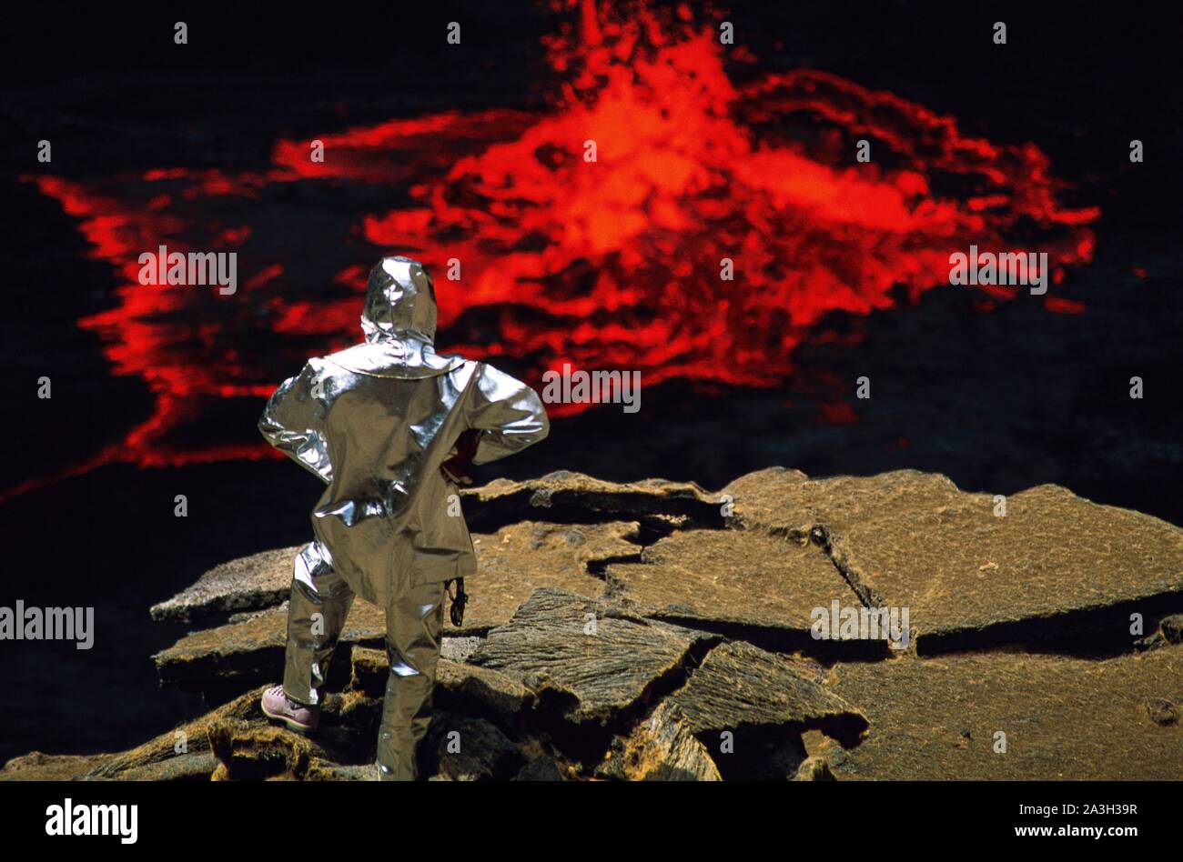 Ethiopia, Danakil Desert, Volcanologists conduct lava sampling in Erta ...