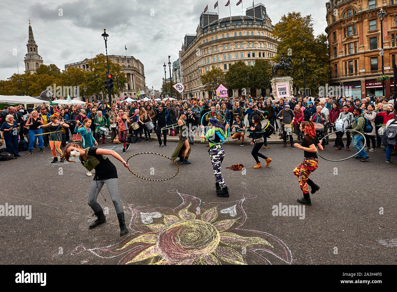 London, U.K. - Oct 8, 2019: Hula-hoop dancers make an impromptu display ...