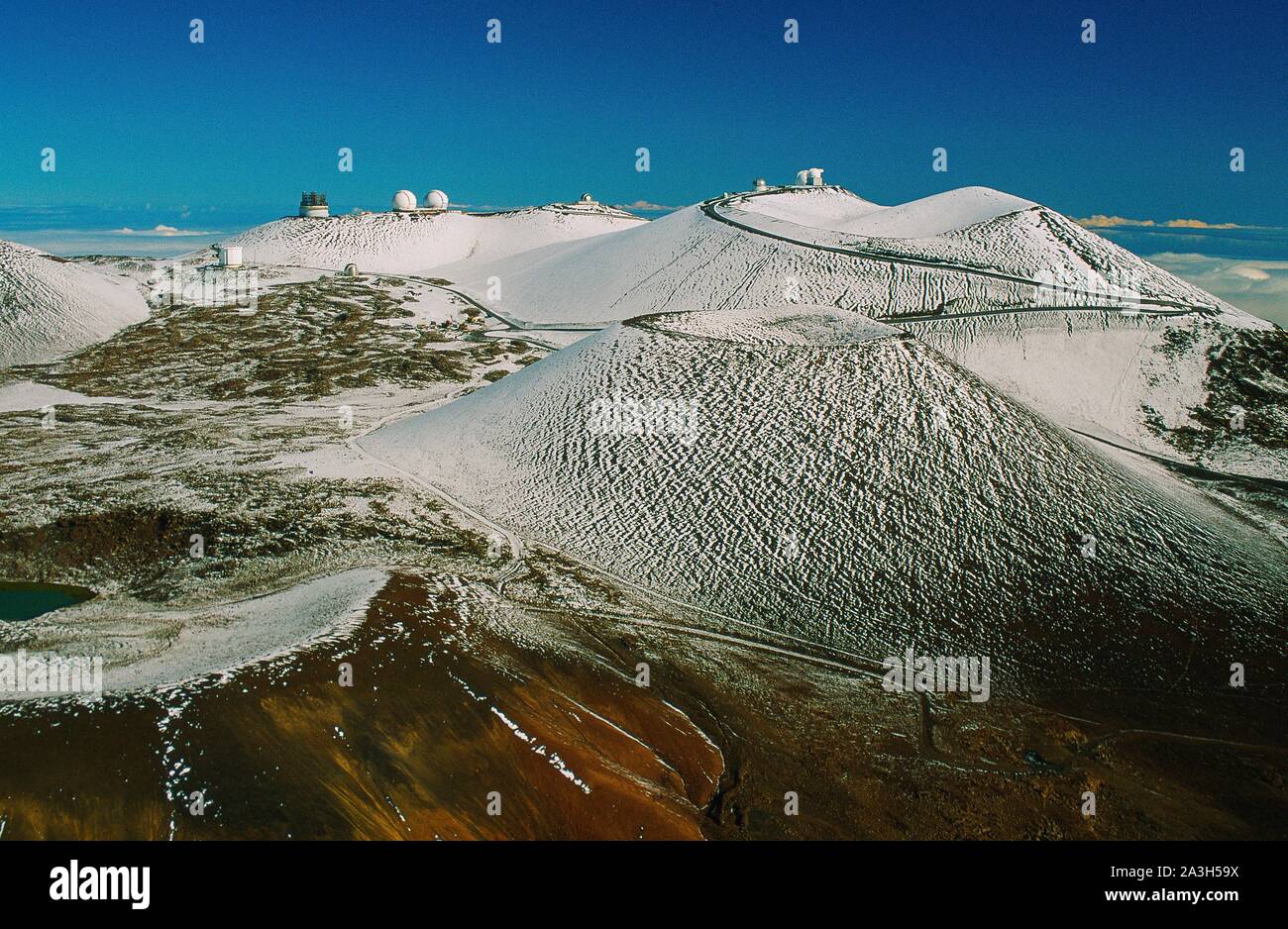 United States, Hawaii, Mona Kea volcano summit seen from the sky with ...
