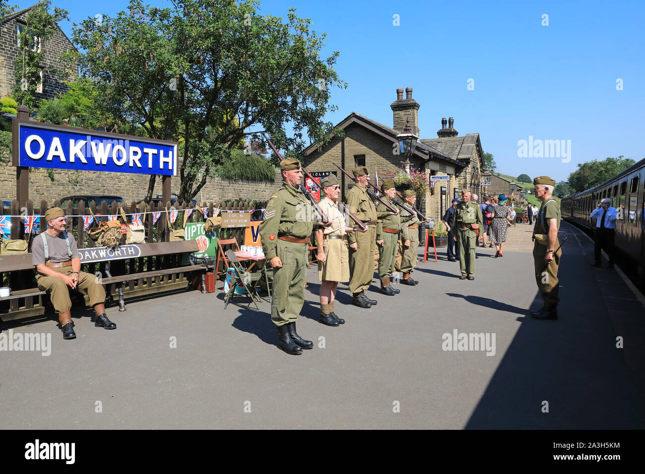 The Haworth Home Guard batallion on parade at Oakworth station, on the ...