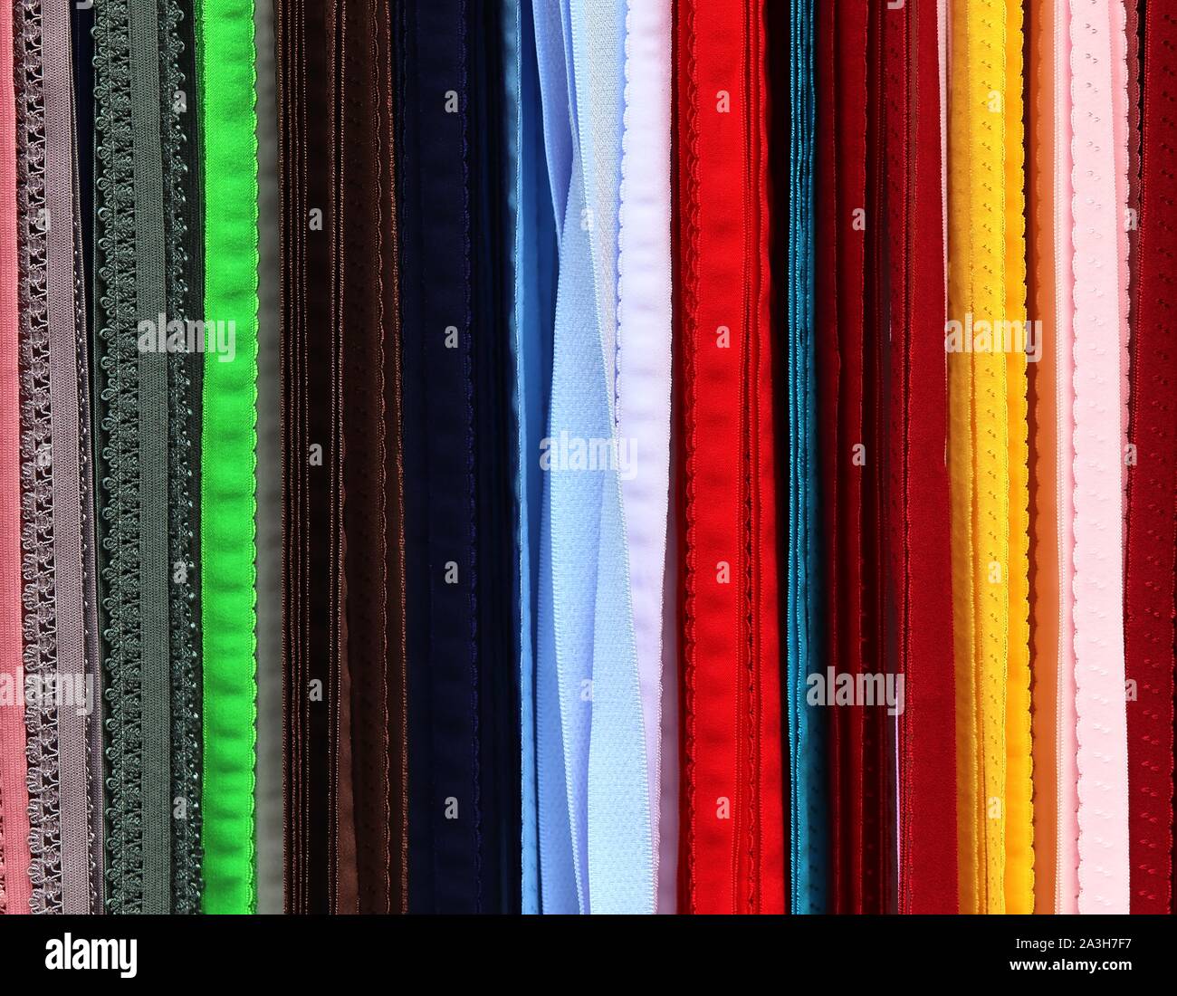 Colorful detailed fabric textures of different cloth types in a close ...
