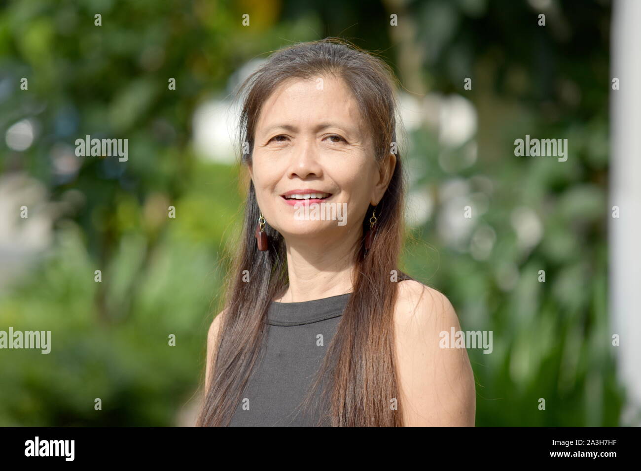 An Older Female Senior Smiling Stock Photo - Alamy