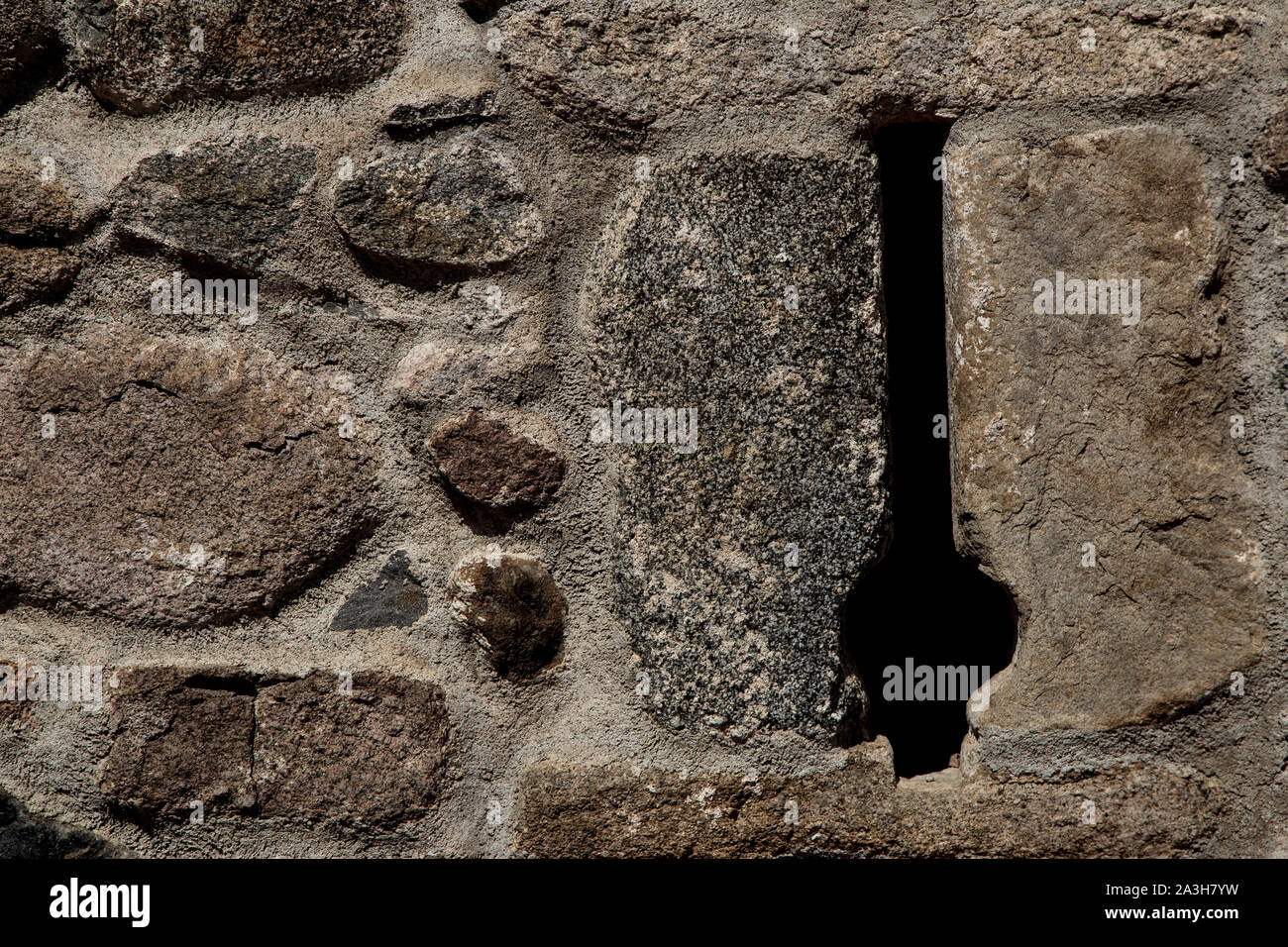 Close up view of stone castle wall with arrow slit Stock Photo - Alamy
